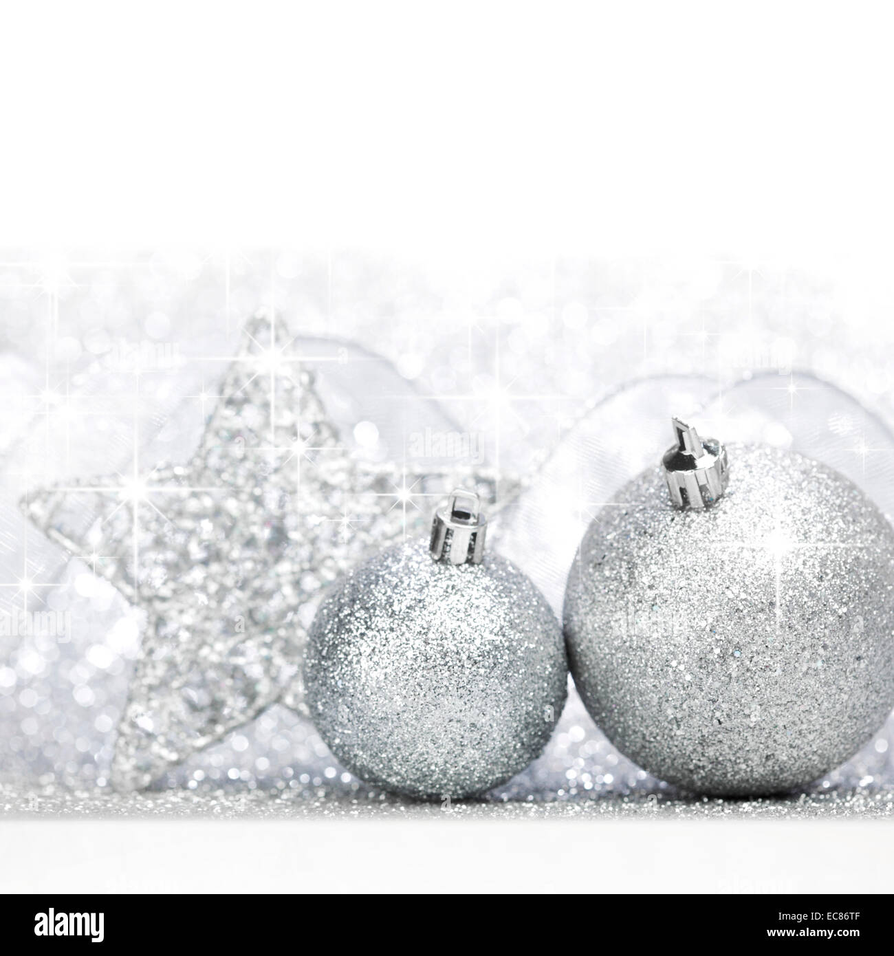 Christmas decoration on snow on shiny glitter background Stock Photo ...