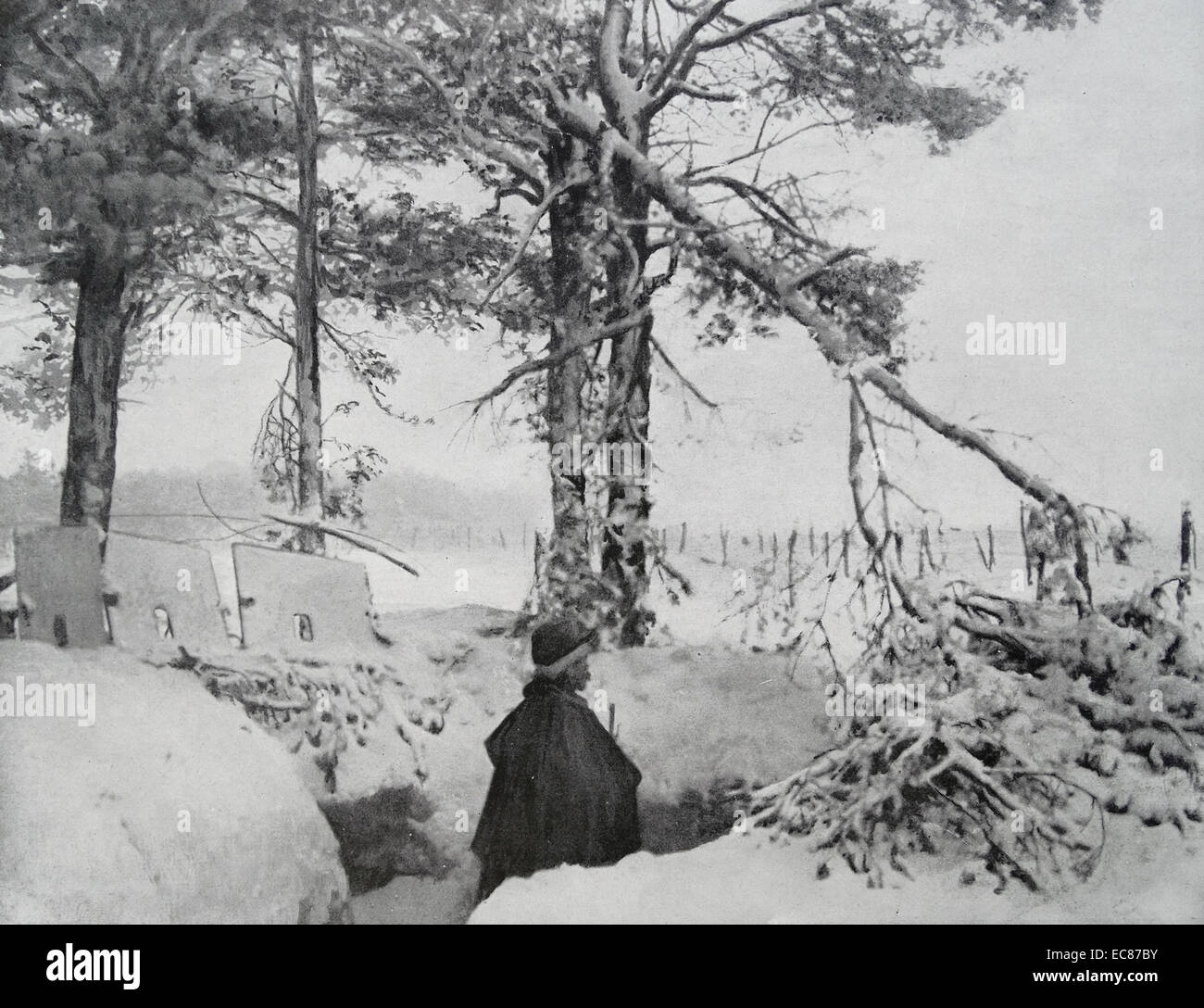 Photograph of a French Soldier in a snow filled trench during World War ...