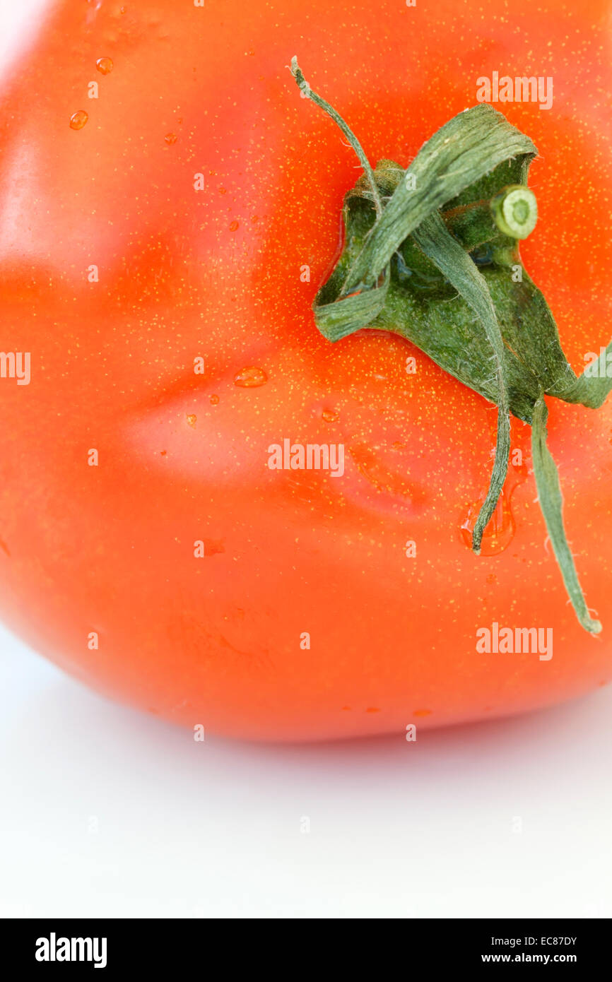 red tomato close-up cropped, studio shot Stock Photo - Alamy