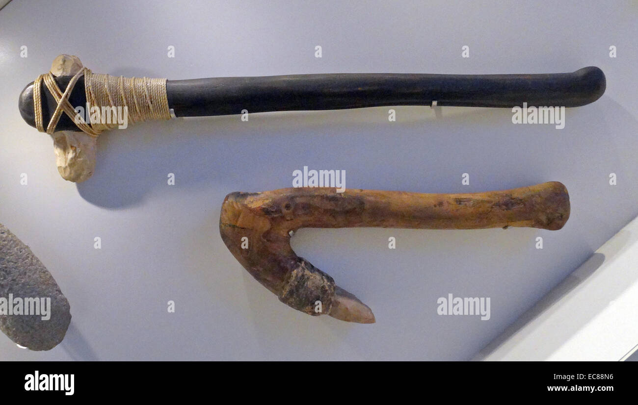 Collection of agricultural tools featuring sickles, sickle blades, axes ...