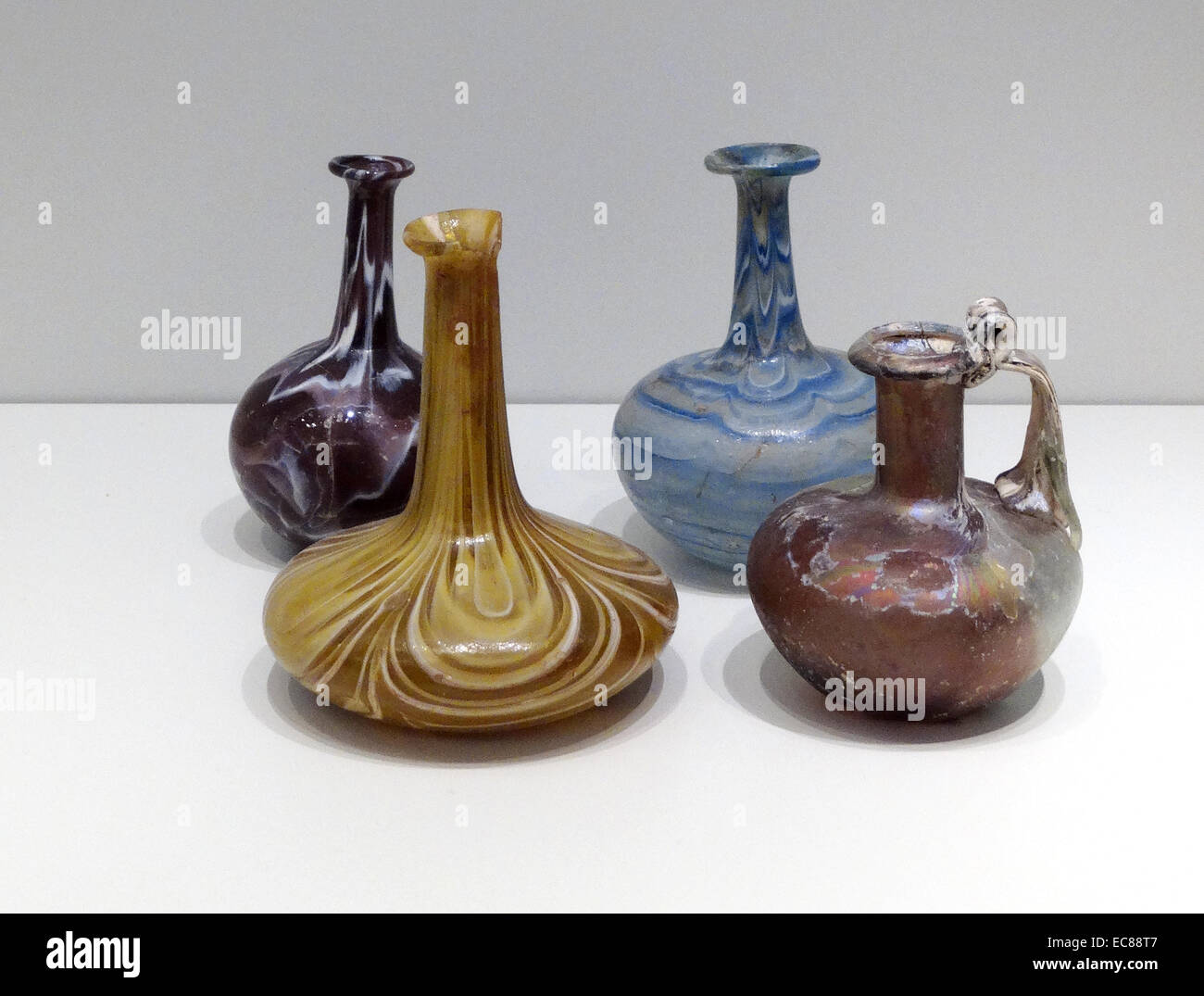 Selection of glass objects including cups, bowls, bottles, ink wells ...