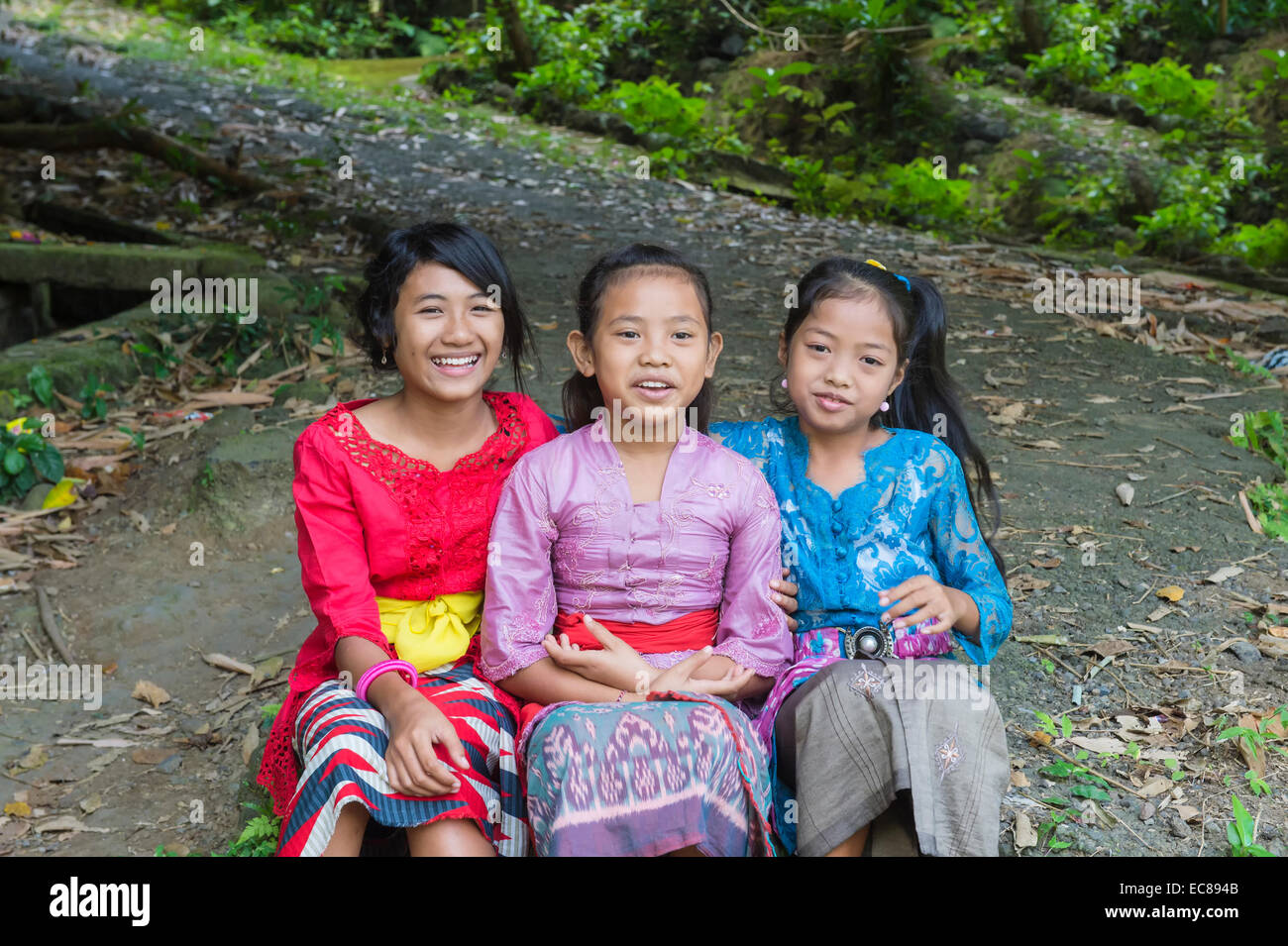 Three Balinese girls smiling, Bali, Indonesia Stock Photo - Alamy