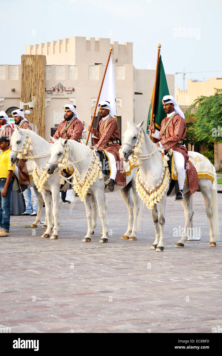Qatar Emiri Knights are performing military stand on Qatar National Day ...