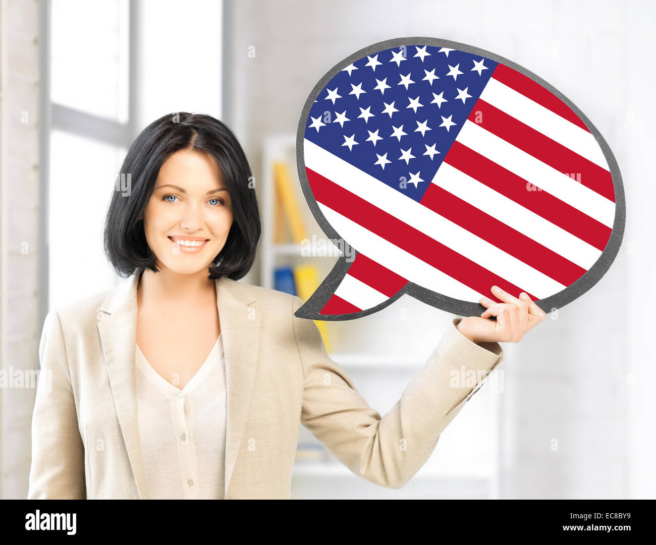 smiling woman with text bubble of american flag Stock Photo - Alamy