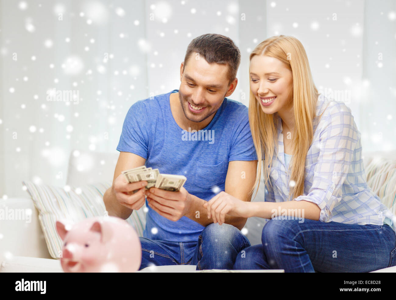 Young couple money home hi-res stock photography and images - Alamy