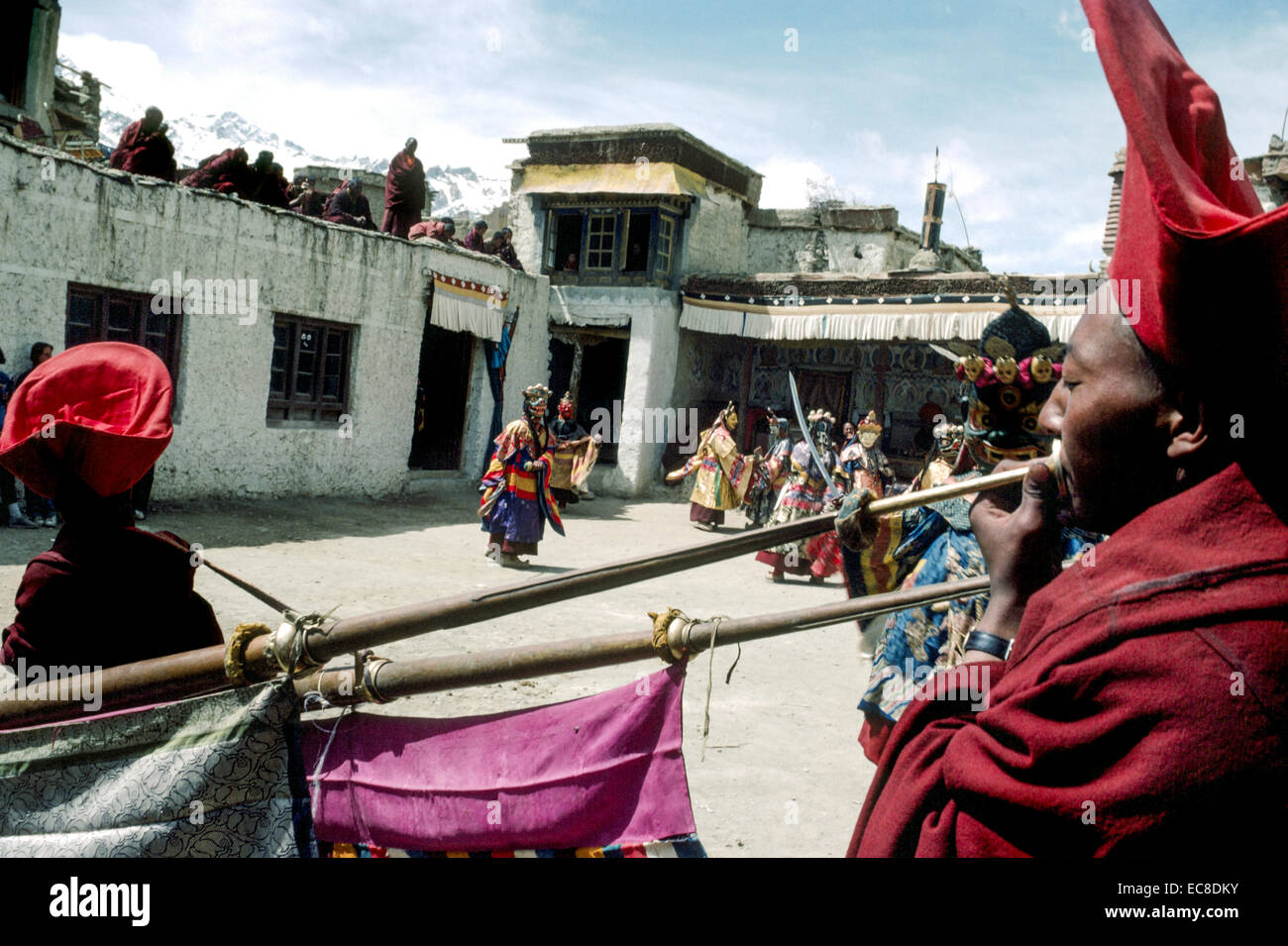 Tibetan monastery monks traditional horns music dancing prayer ...