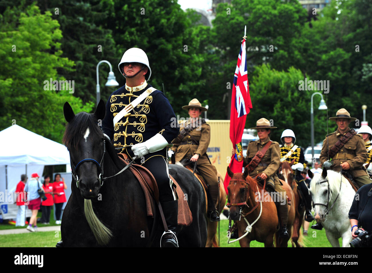 Military reenactors on horseback participate in Canada Day Celebrations ...