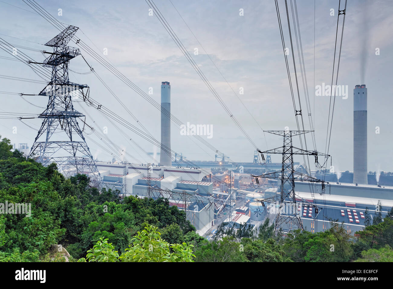 coal power station under grey cloud in hong kong Stock Photo - Alamy