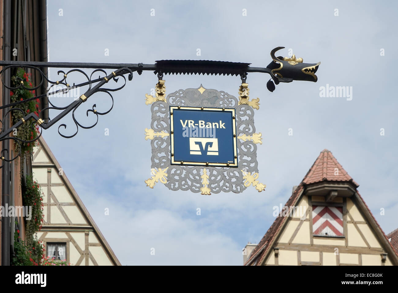 VR-Bank hanging signs in Rothenburg Stock Photo - Alamy