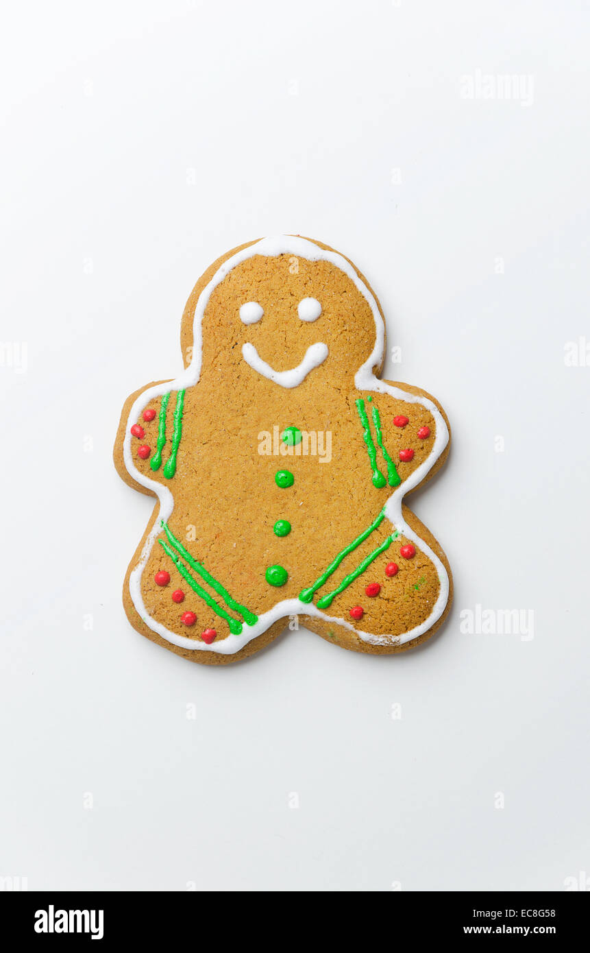 Homemade gingerbread man over white background, above view Stock Photo ...