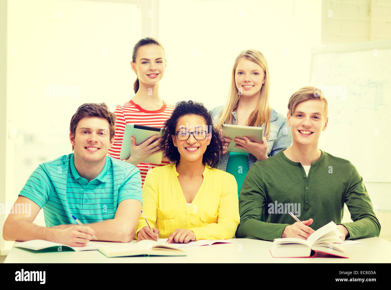 students with textbooks and books at school Stock Photo - Alamy