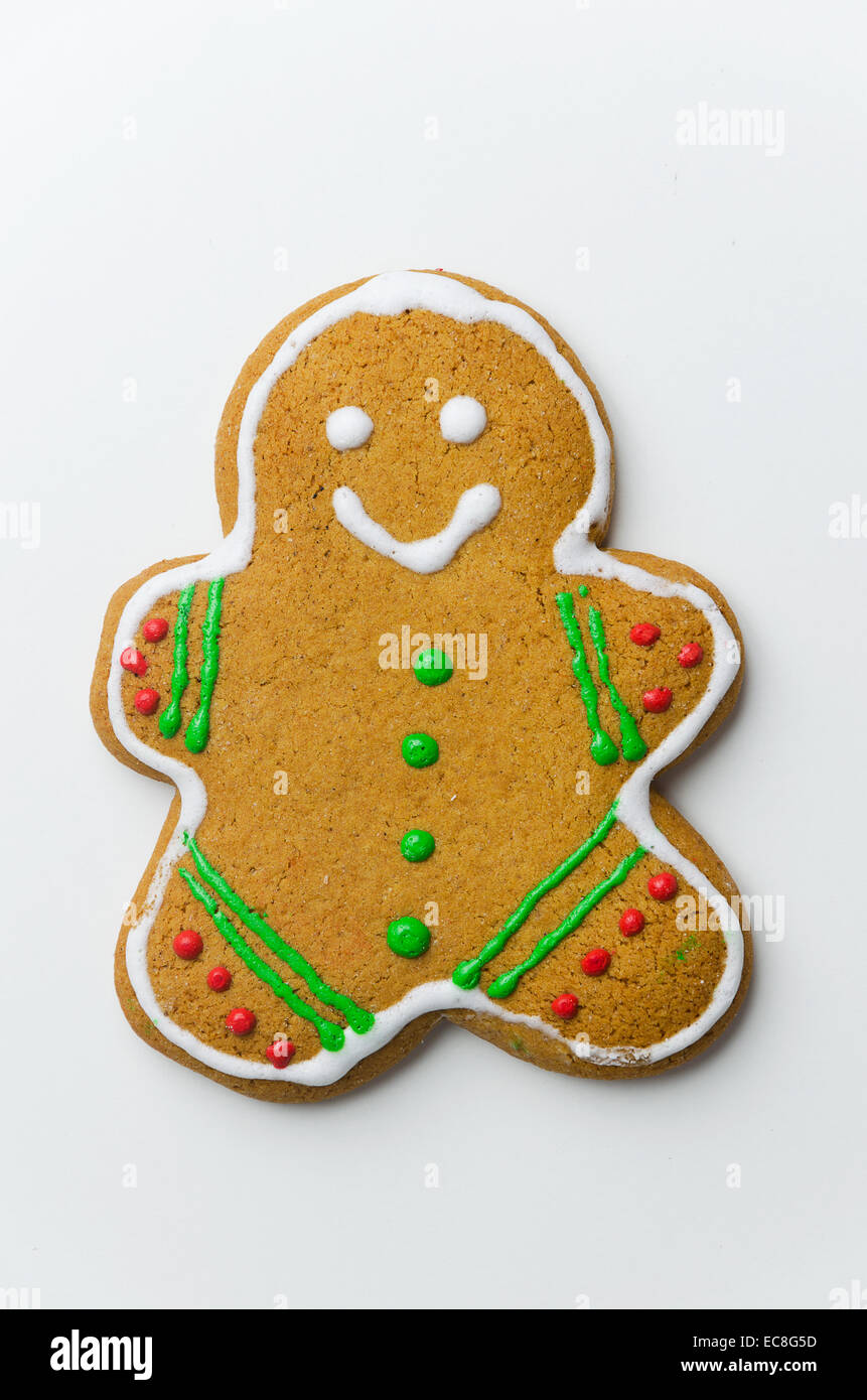 Homemade gingerbread man over white background, above view Stock Photo ...