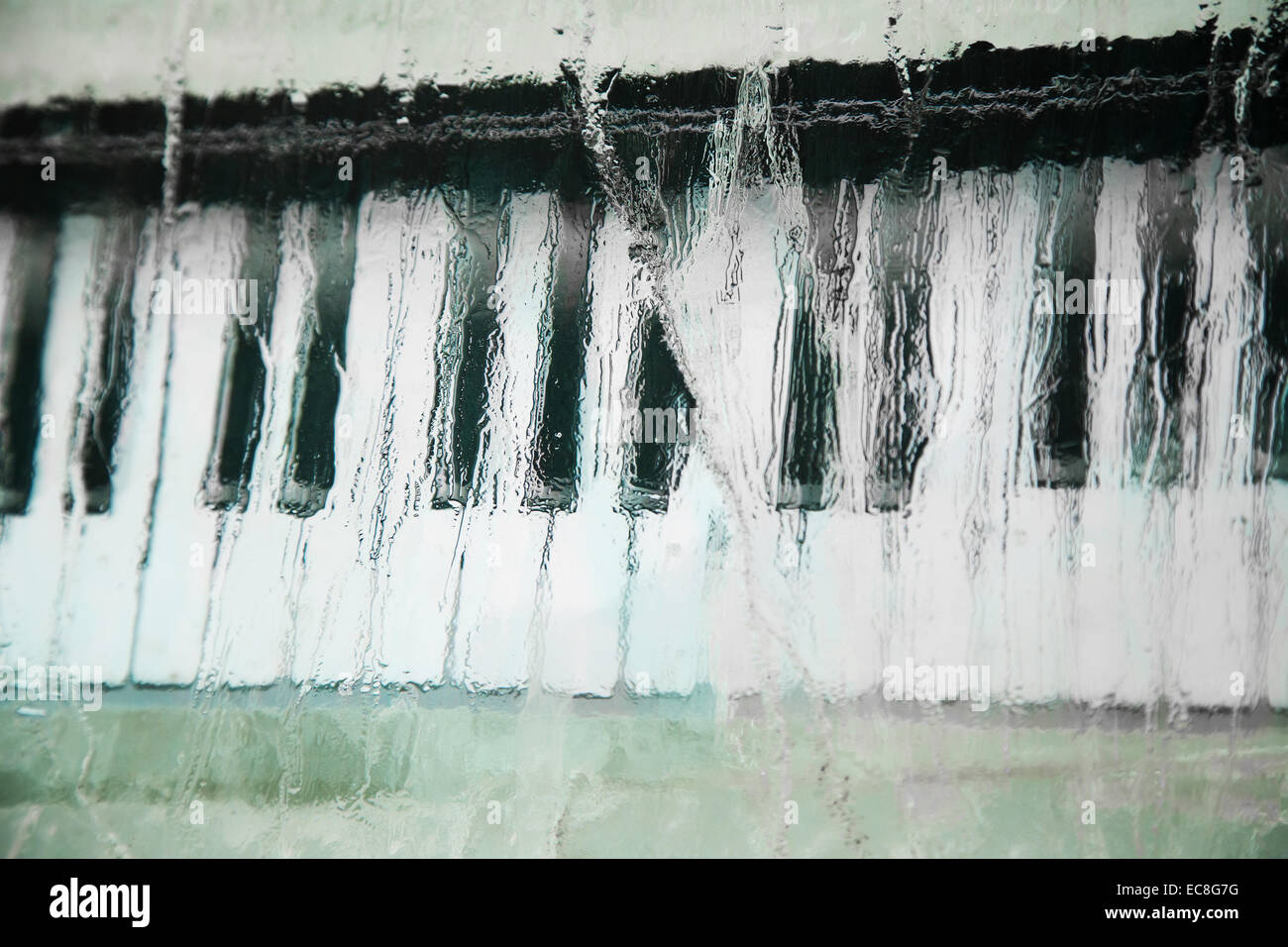 Piano keys into the ice Stock Photo - Alamy