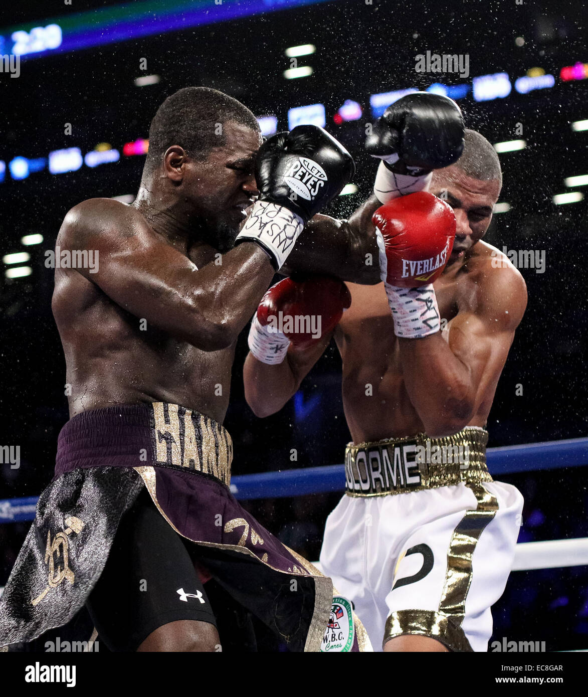 Brooklyn, New York, USA. 6th Dec, 2014. THOMAS DULORME (white & gold ...