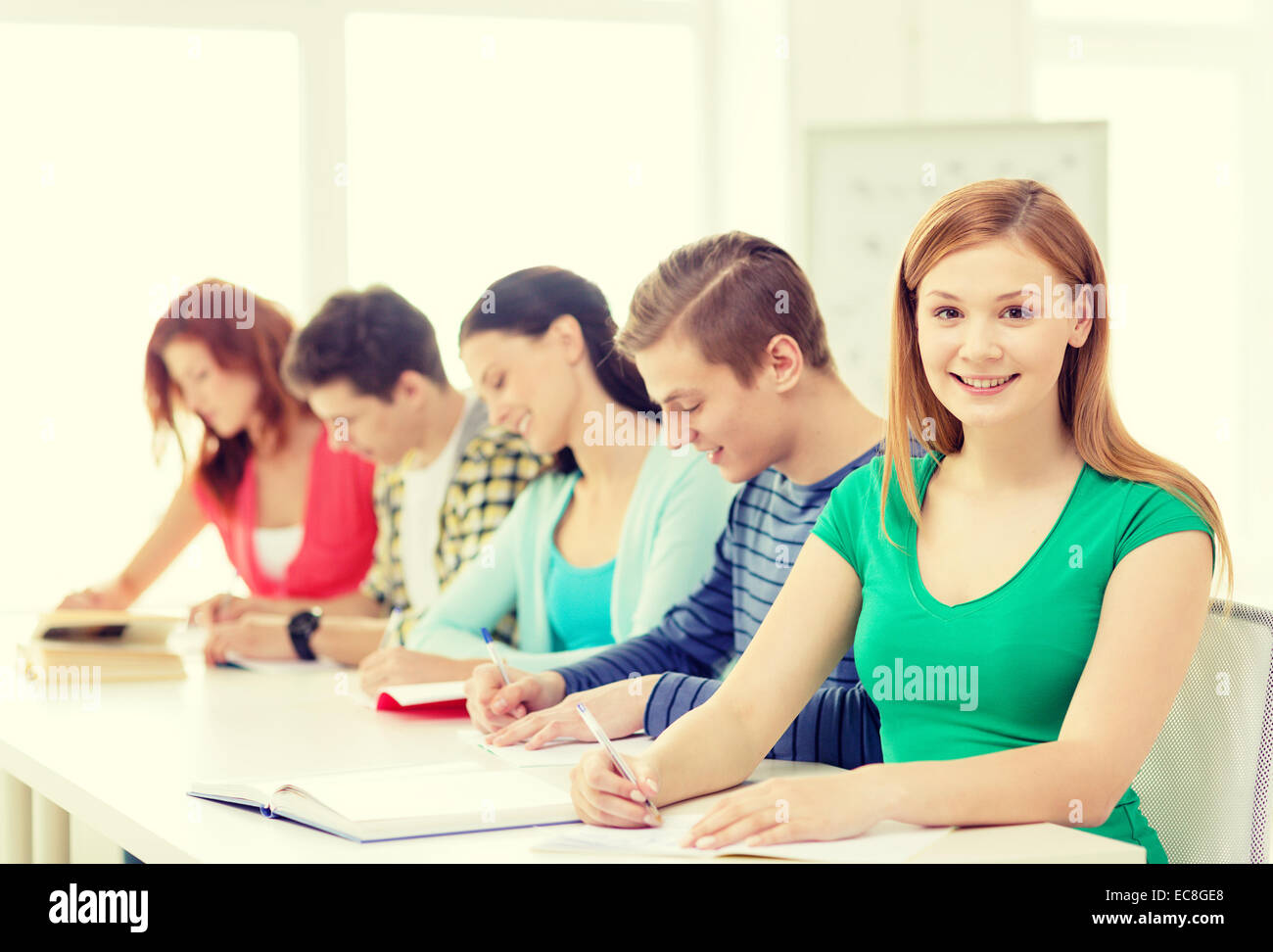 students with textbooks and books at school Stock Photo - Alamy