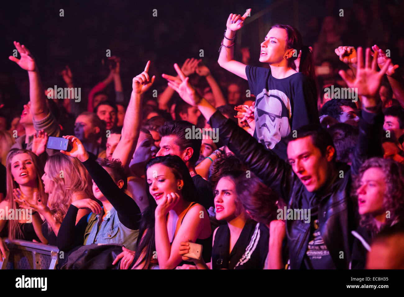 Boy in crowd on shoulders hi-res stock photography and images - Alamy