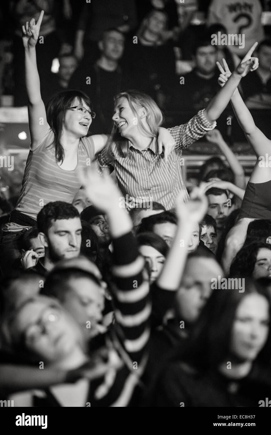 Boy in crowd on shoulders hi-res stock photography and images - Alamy