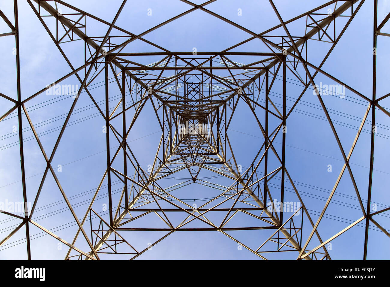 Underneath an electricity pylon, looking up through the middle Stock ...