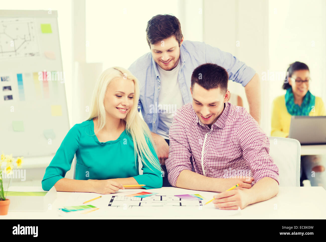 smiling interior designers working in office Stock Photo - Alamy smiling interior designers working in office Stock Photo - Alamy
