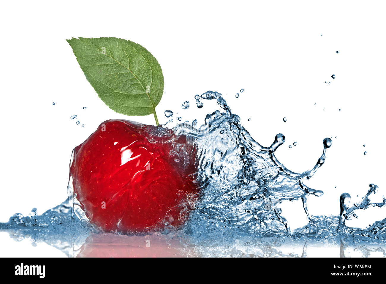 Red apple and water splash isolated on white Stock Photo - Alamy