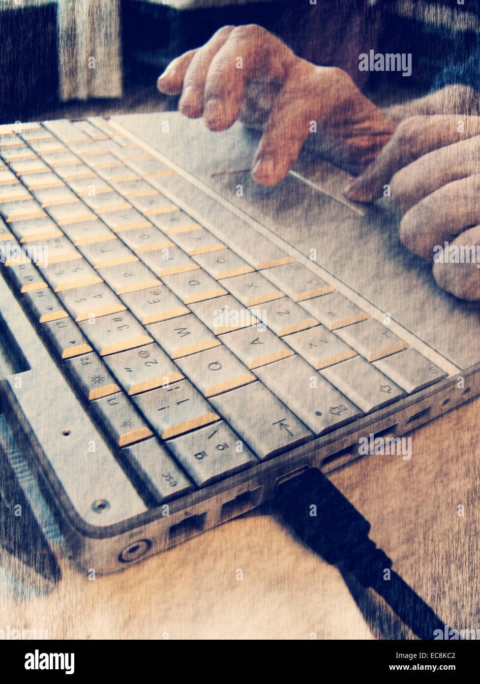 Hands typing on a lap-top Stock Photo - Alamy