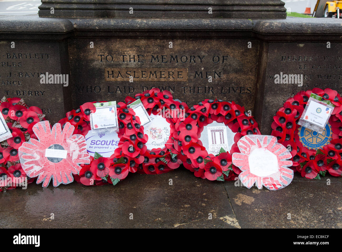 Poppy wreaths laid against the base of a war memorial Stock Photo - Alamy