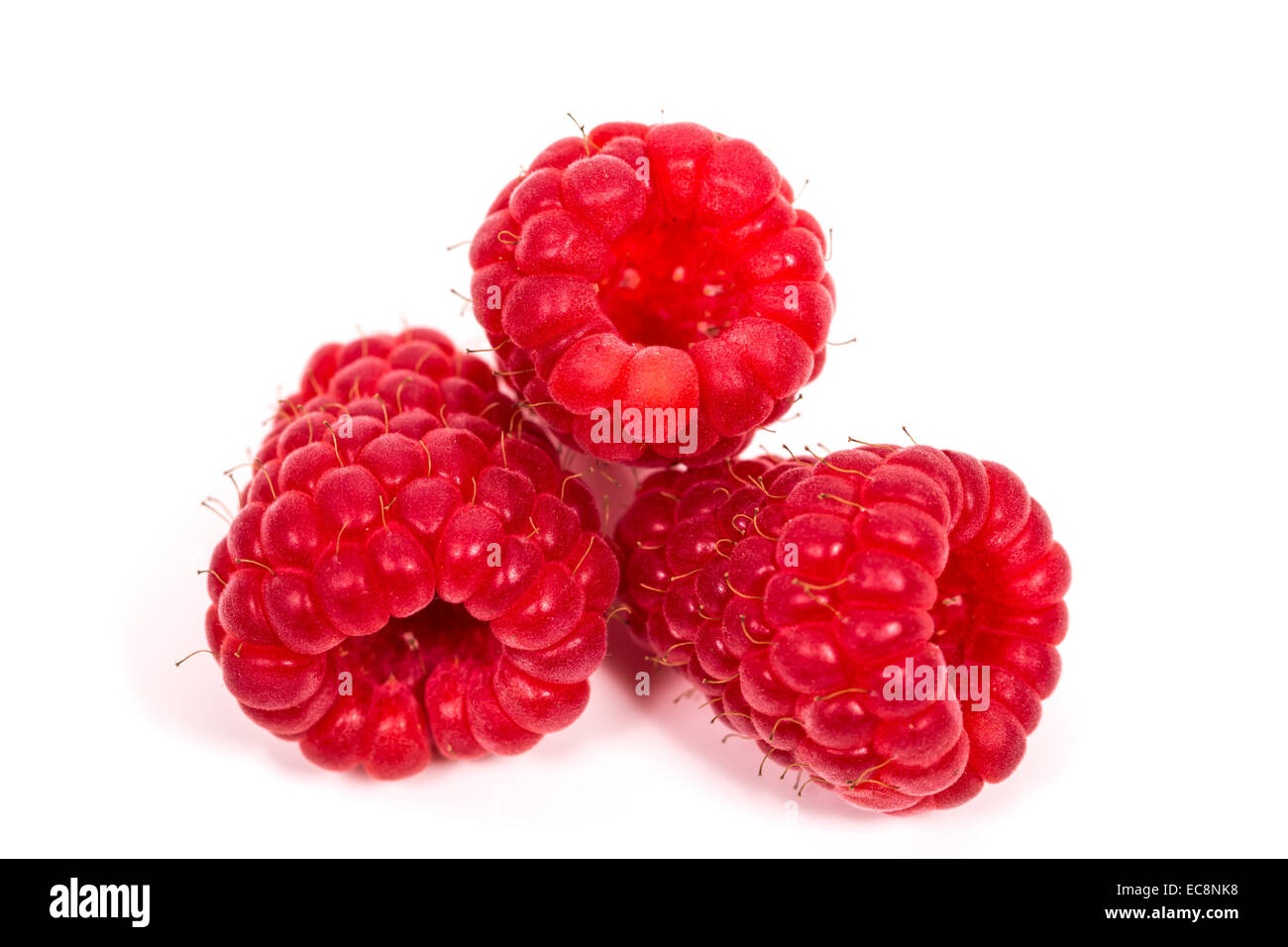 ripe red raspberry isolated on white background Stock Photo - Alamy