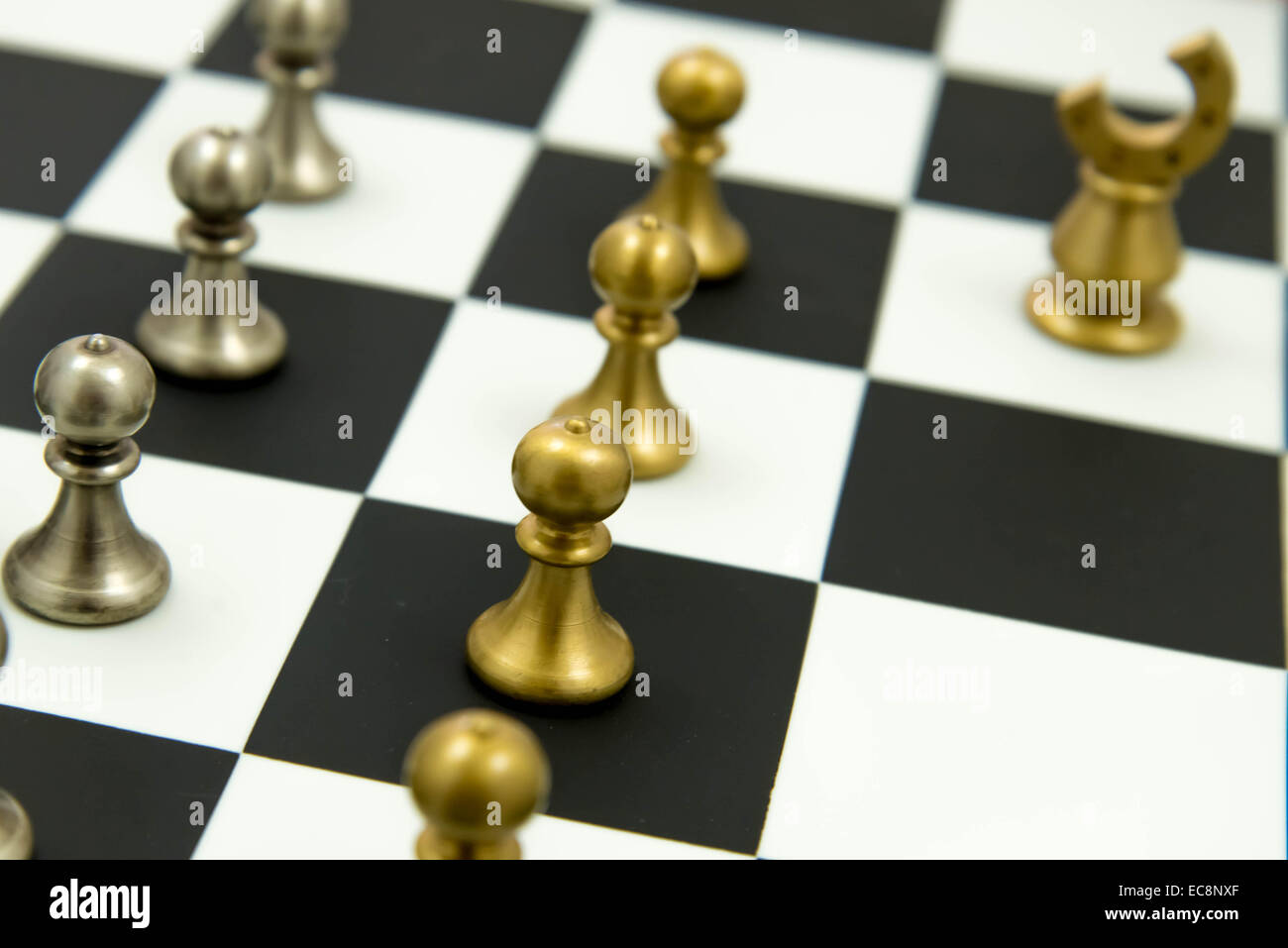 Classic chess game - pieces in play on chessboard Stock Photo - Alamy