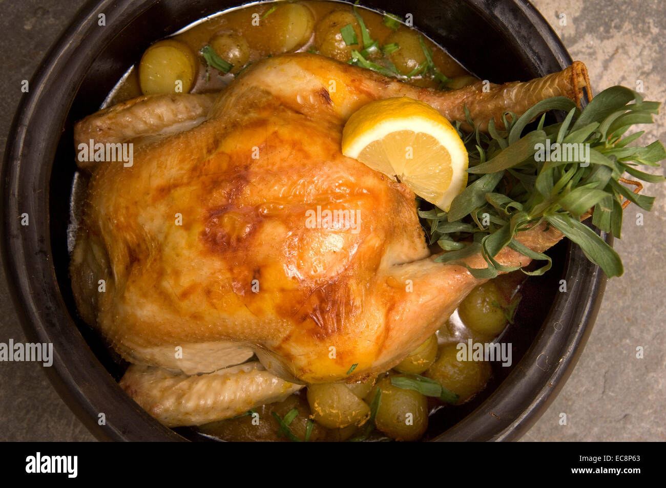 Roasted lemon chicken Stock Photo - Alamy