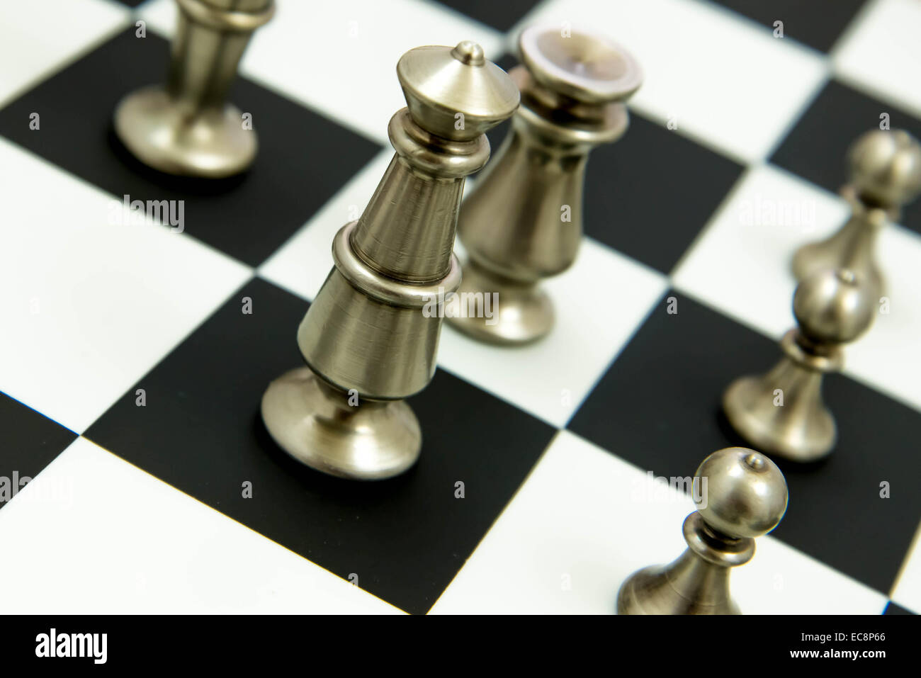 Classic chess game - pieces in play on chessboard Stock Photo - Alamy