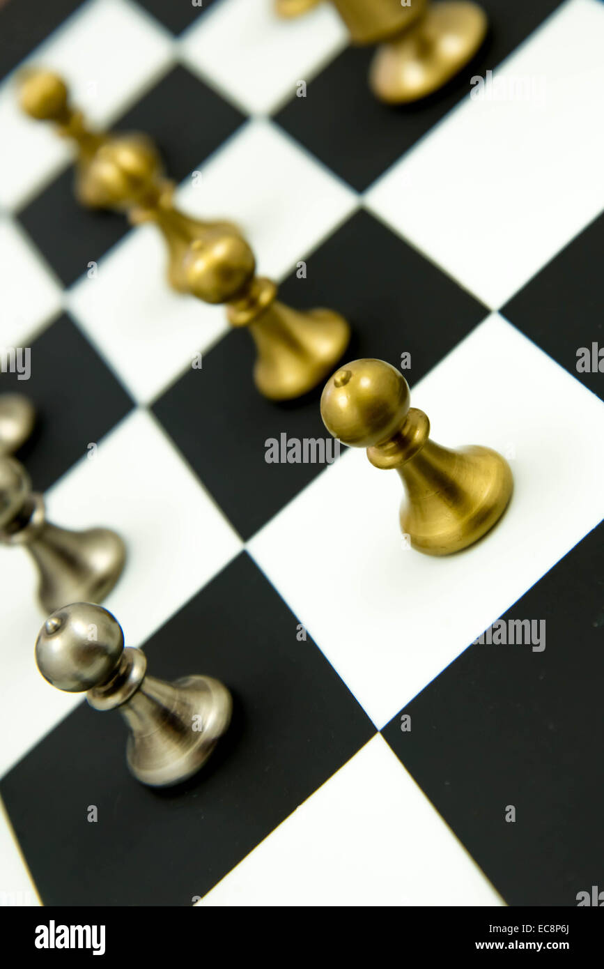 Classic chess game - pieces in play on chessboard Stock Photo - Alamy