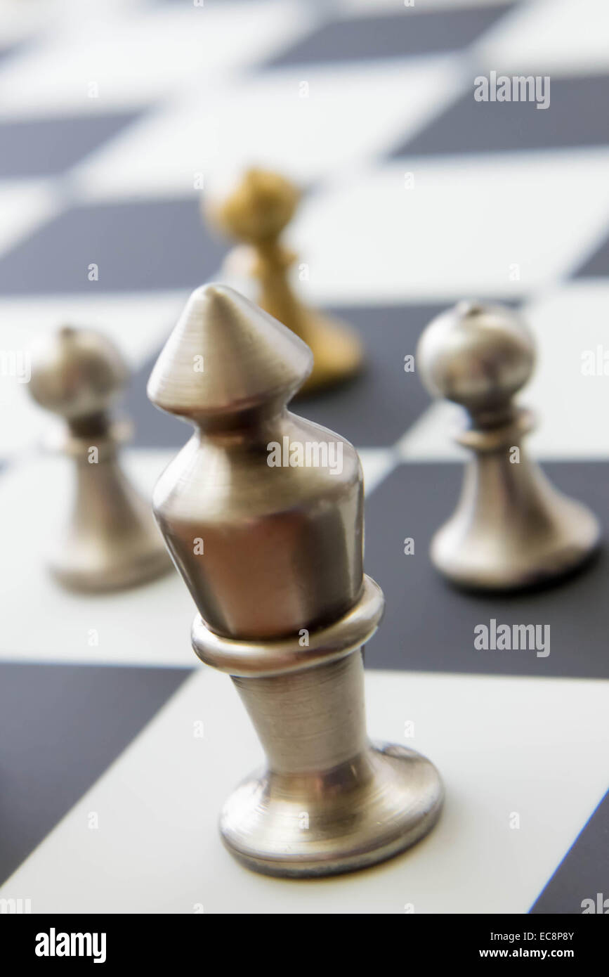 Classic chess game - - view of playing pieces on chessboard with ...