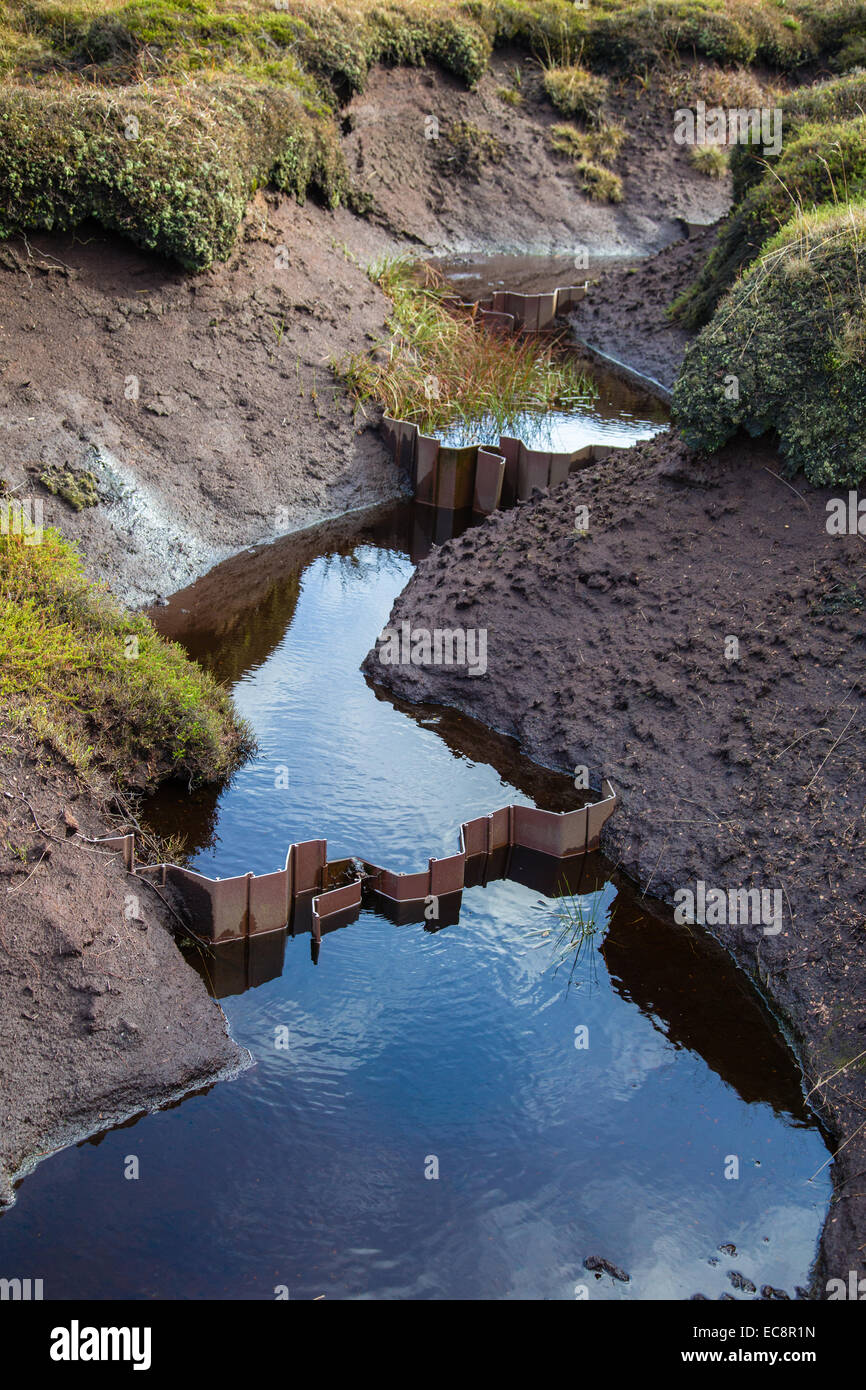 Plastic corrugated dams installed to reduce erosion of the peat haggs ...