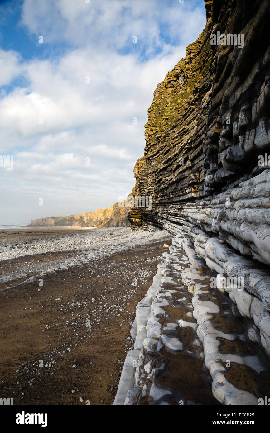 Eroded strata of Jurassic Lias limestone in cliffs at Nash Point on the ...