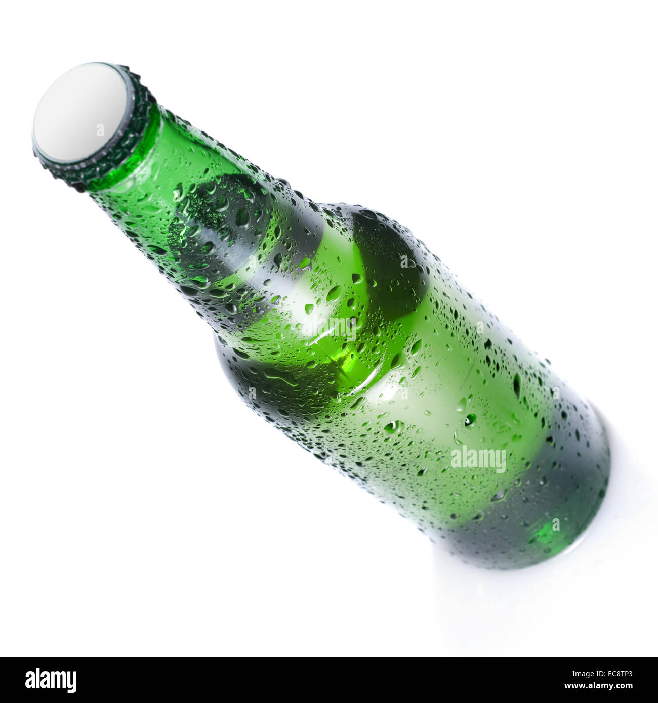 Green beer bottle with water drops isolated on white Stock Photo - Alamy