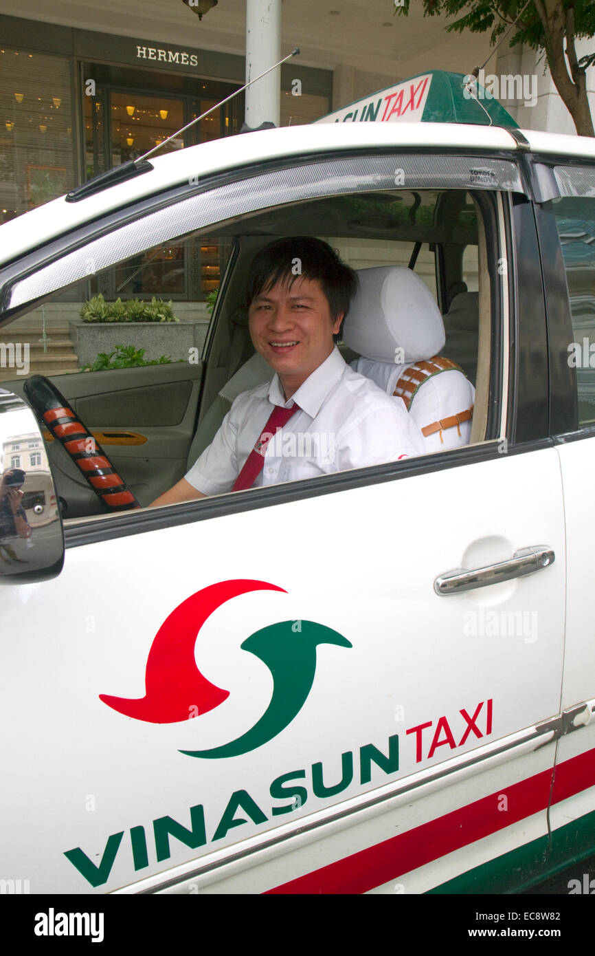Vina Sun taxi and driver in Ho Chi Minh City, Vietnam Stock Photo - Alamy