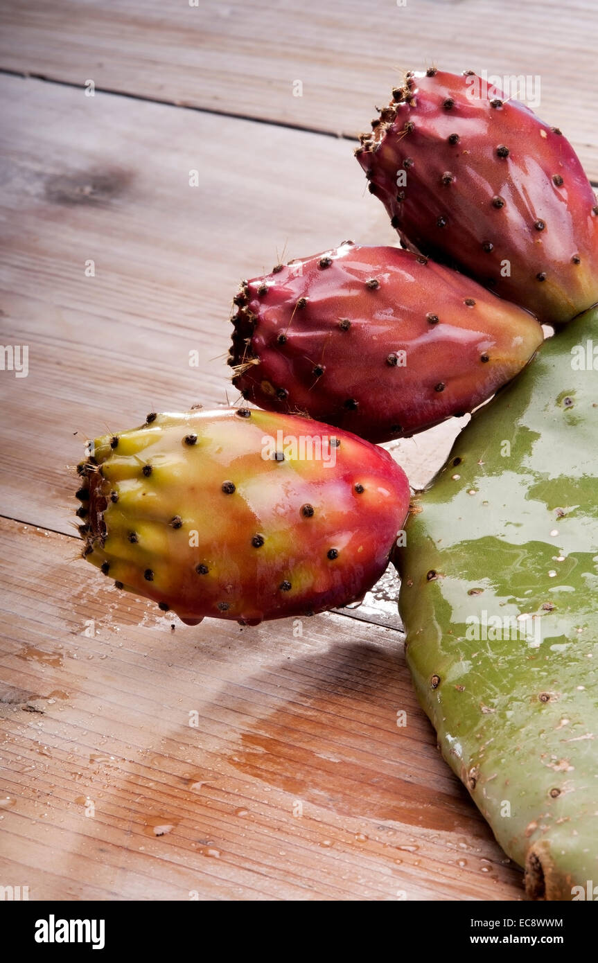 Tropical Opuntia Prickly Pear fruit on wooden background Stock Photo ...