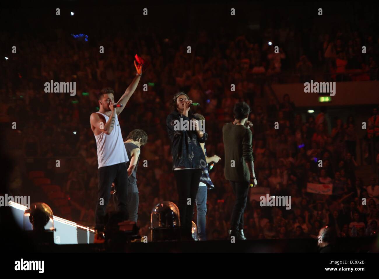 One Direction performing live on stage at Wembley Where: London, United ...