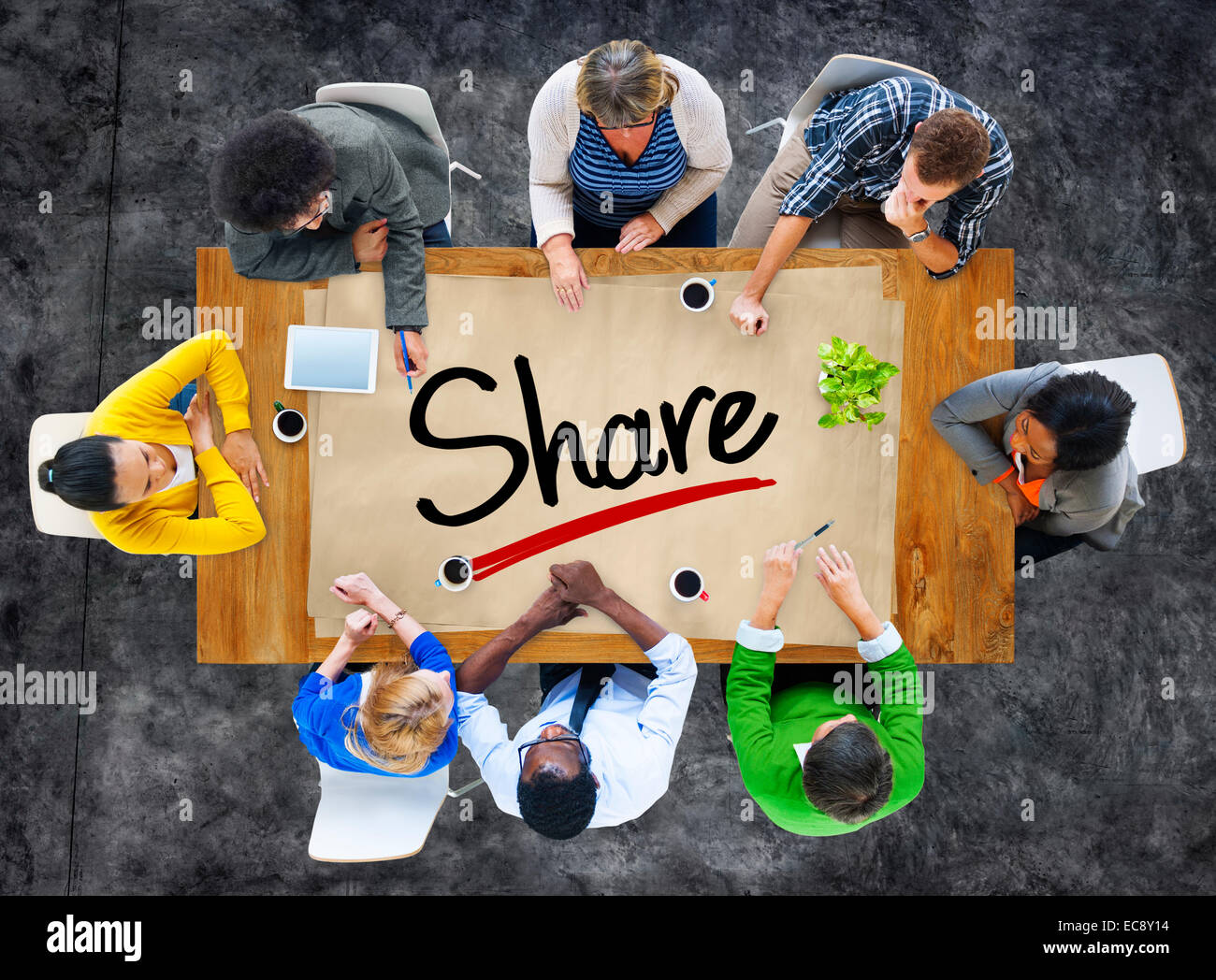 People in a Meeting and Single Word Share Stock Photo - Alamy