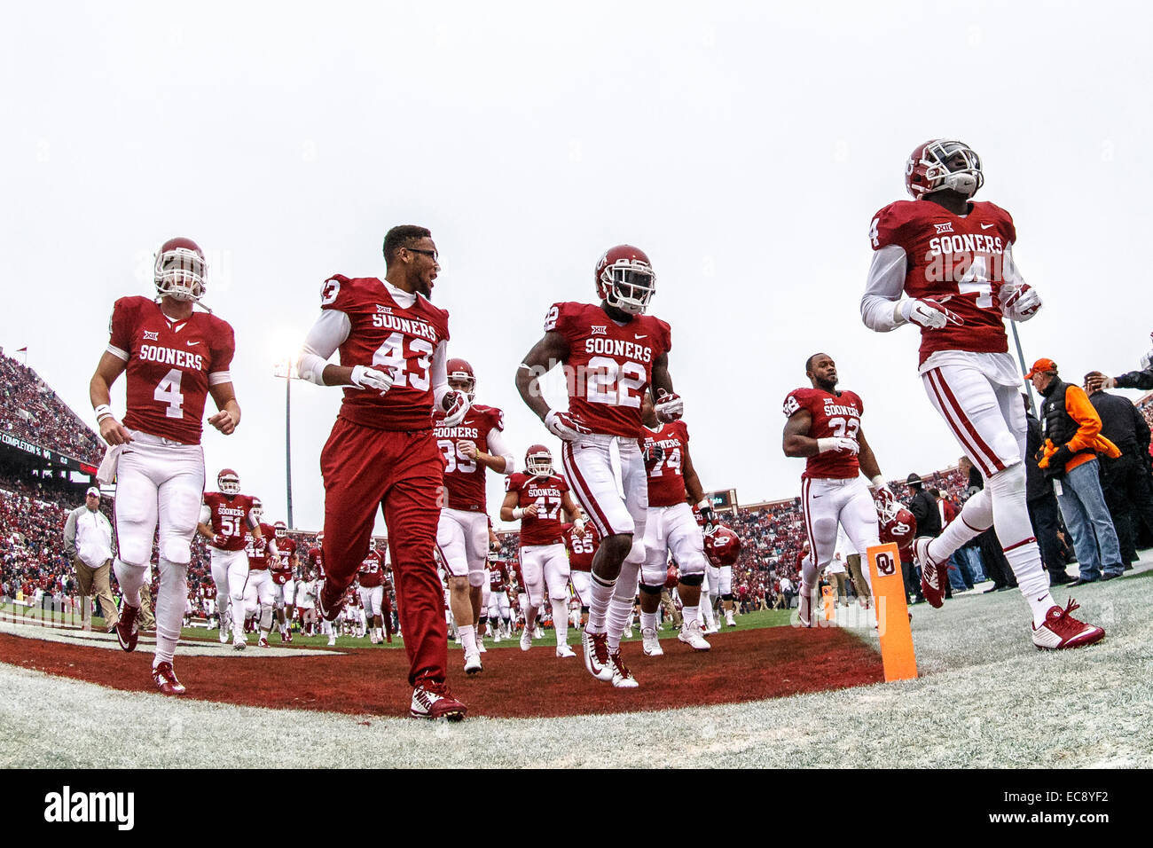 December 6, 2104: Oklahoma Sooners players head to the locker room ...
