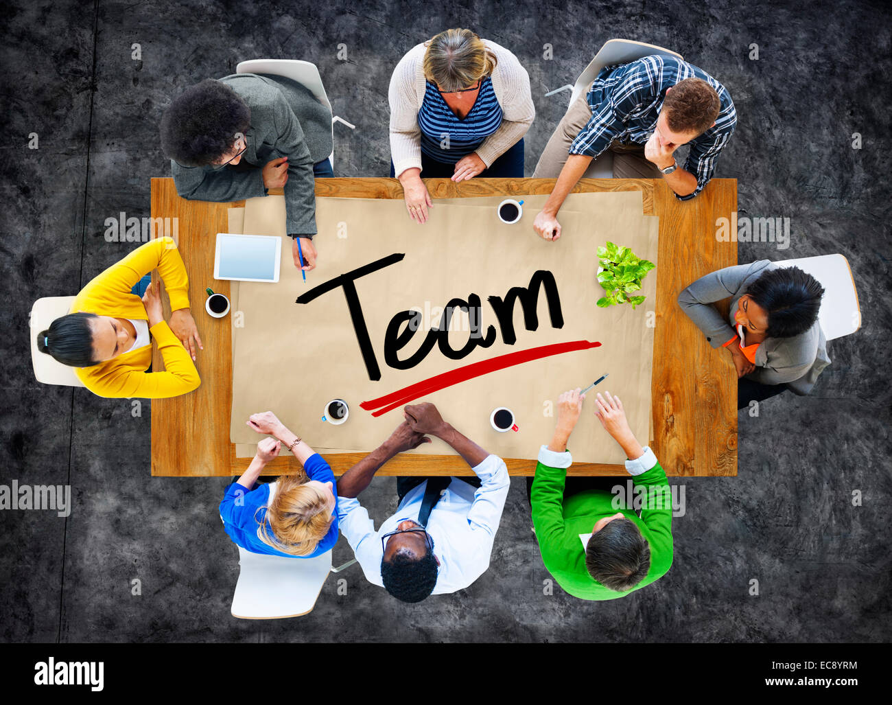People in a Meeting and Single Word Team Stock Photo - Alamy