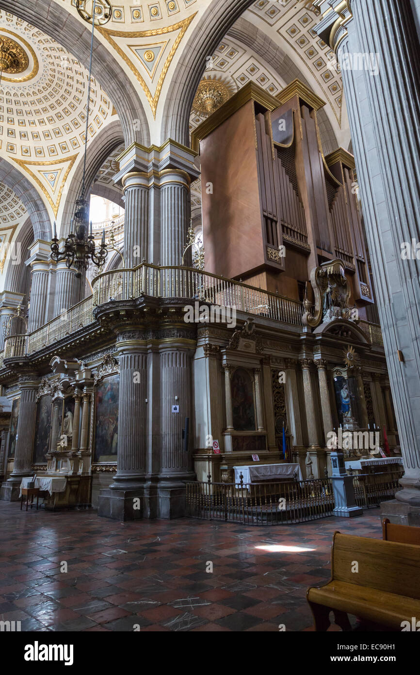Interior arches and columns in the Cathedral of Puebla, a 16th century ...