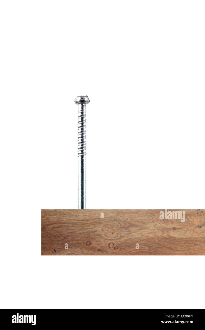 A close up shot of a nail in wood Stock Photo - Alamy