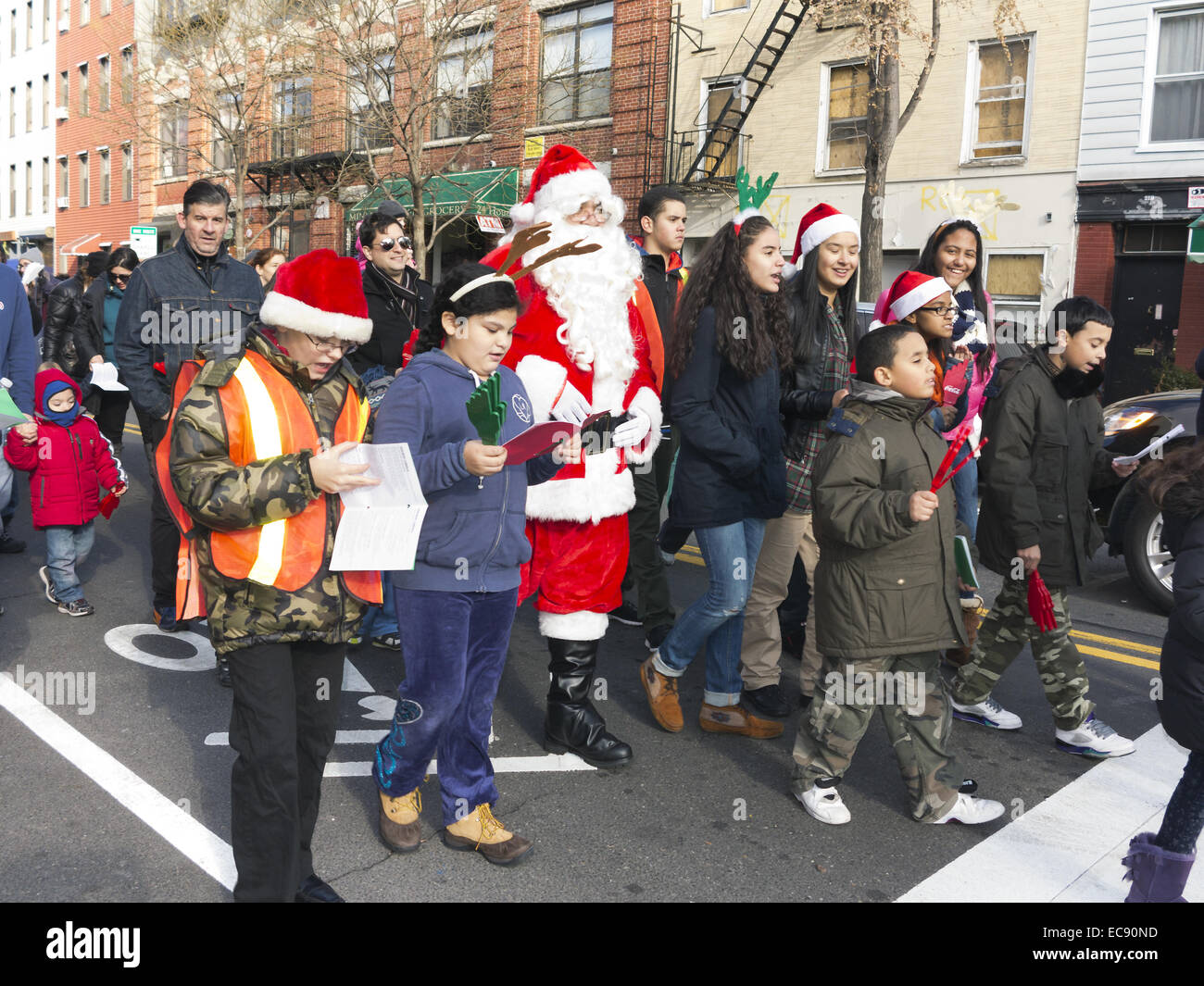 Hispanic Santa leads the Santa Jingle Bell Parade in the Greenpoint ...