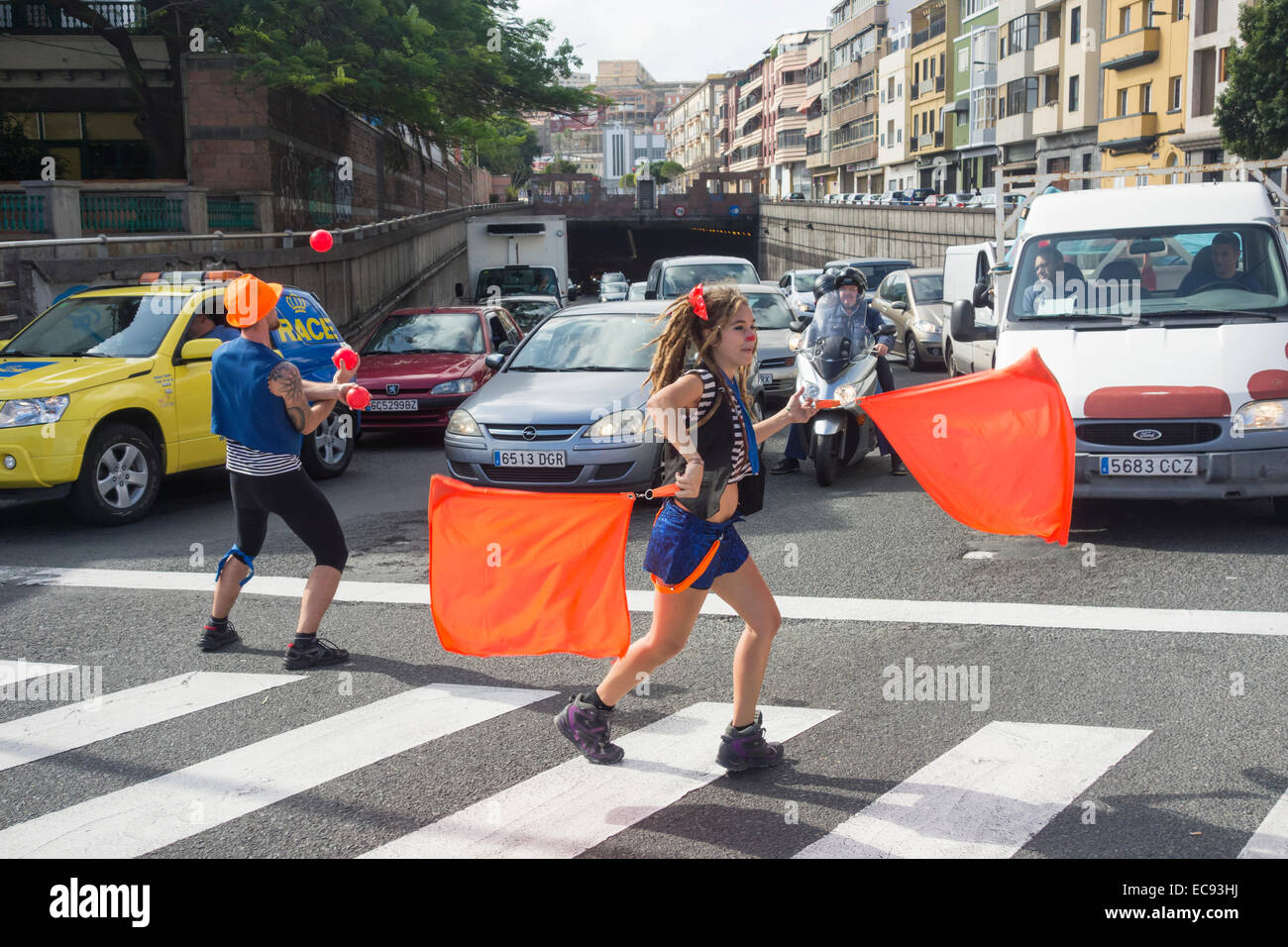 Busking at traffic lights hi-res stock photography and images - Alamy
