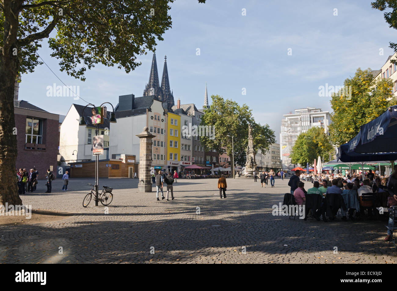 COLOGNE, GERMANY - SEPTEMBER 24: People on a street with bars and ...