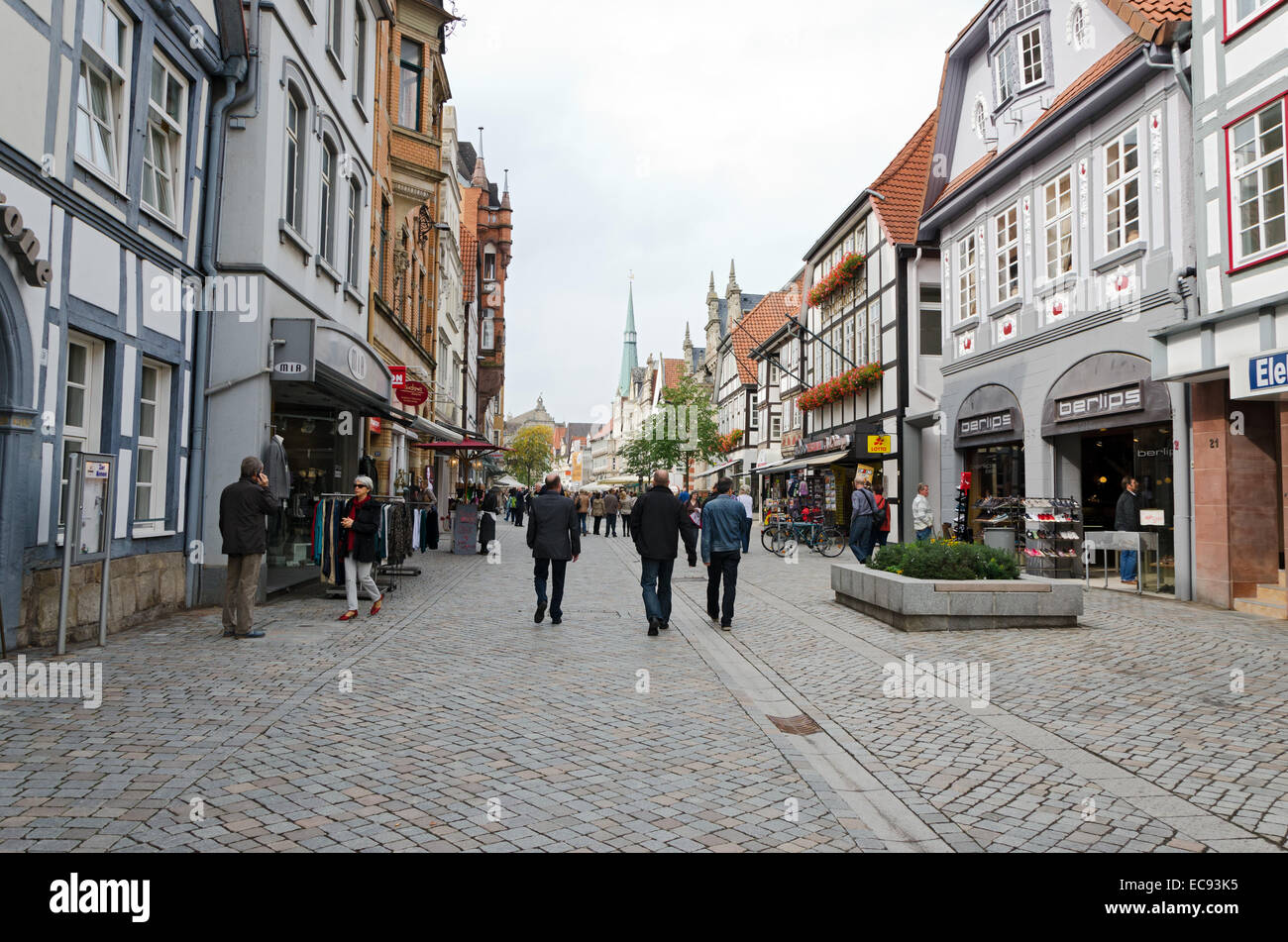 HAMELN, GERMANY - SEPTEMBER 25: Pedestrians walking along a commercial ...