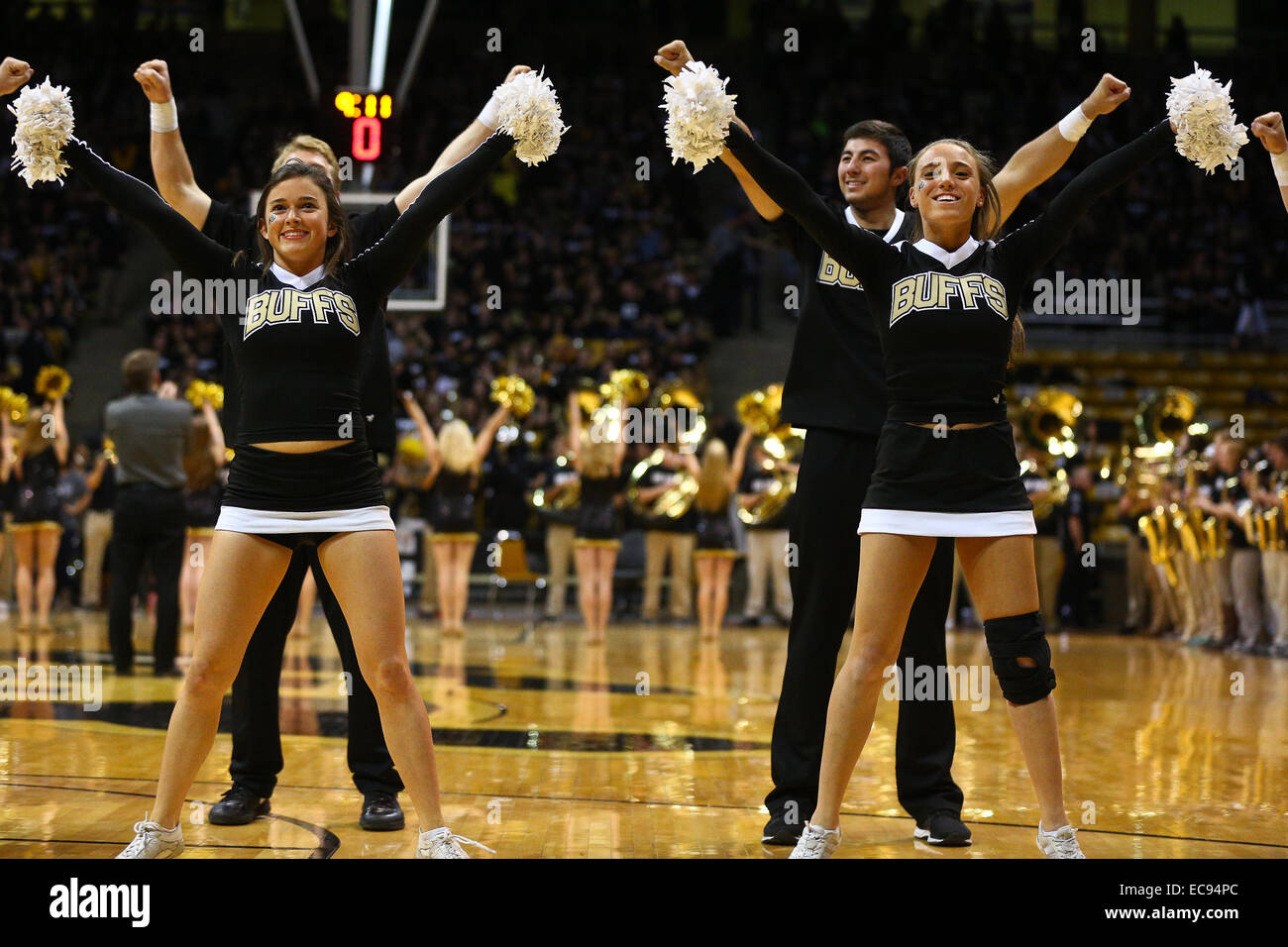 Boulder. 10th Dec, 2014. Colorado cheerleaders cheer on their team ...