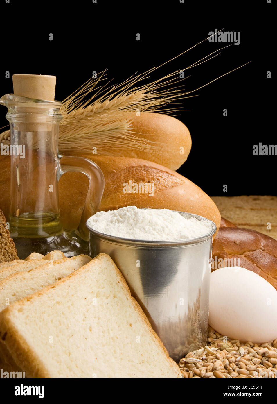 bread and bakery products on wood isolated at black background Stock ...