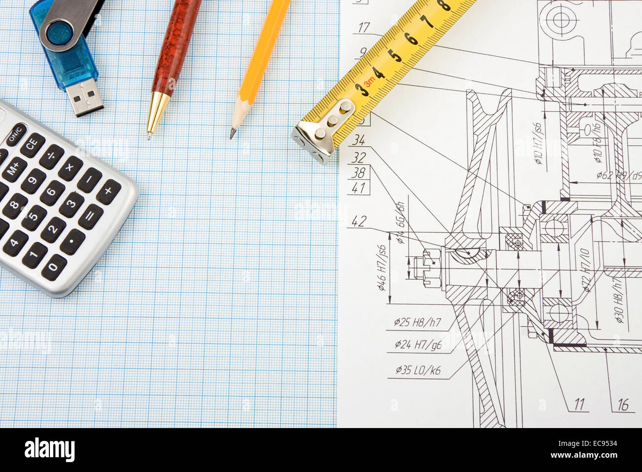 pen, pencil and memory flash stick on drafting Stock Photo - Alamy